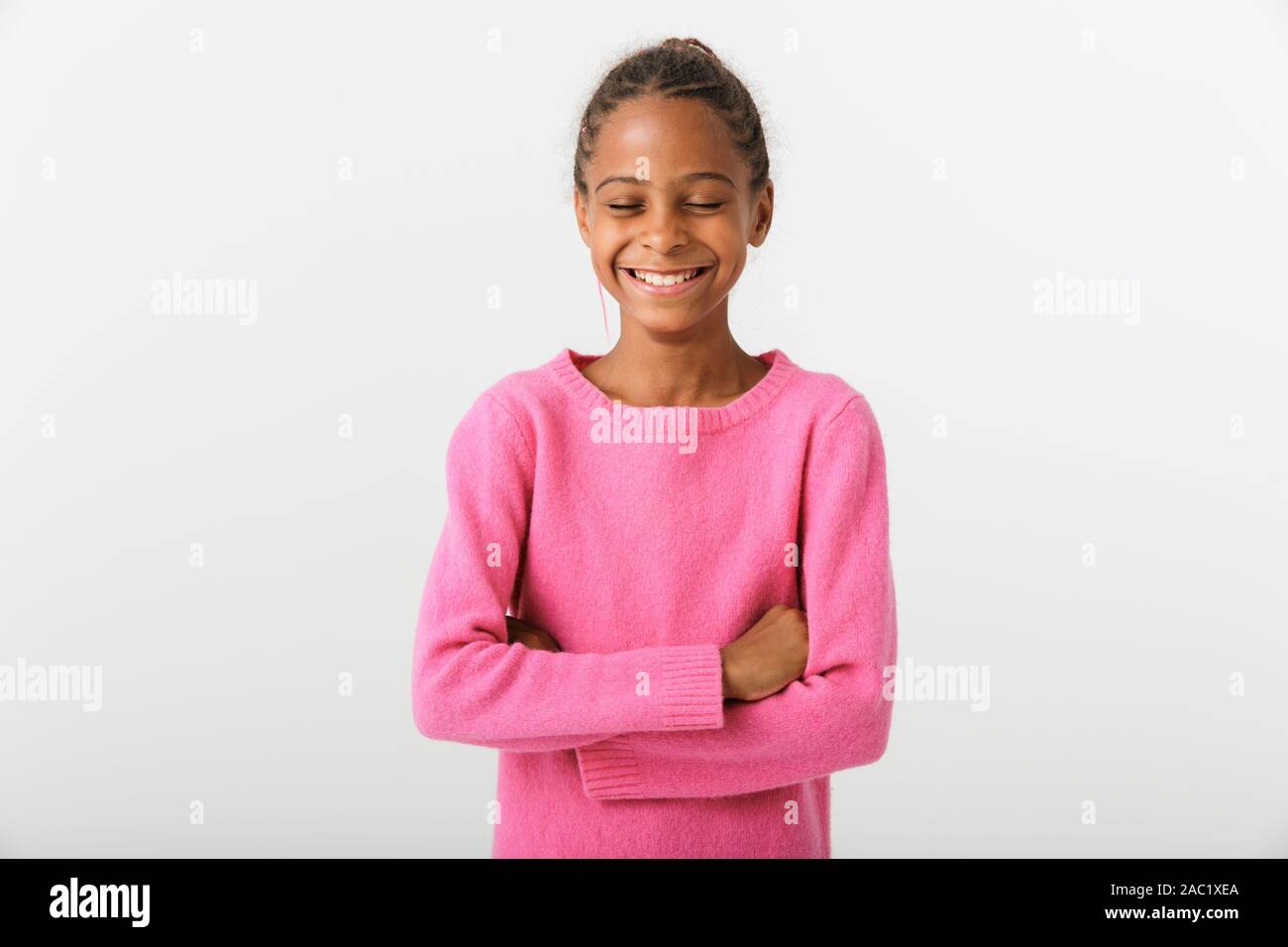 Image of african american happy girl laughing and posing with hands ...
