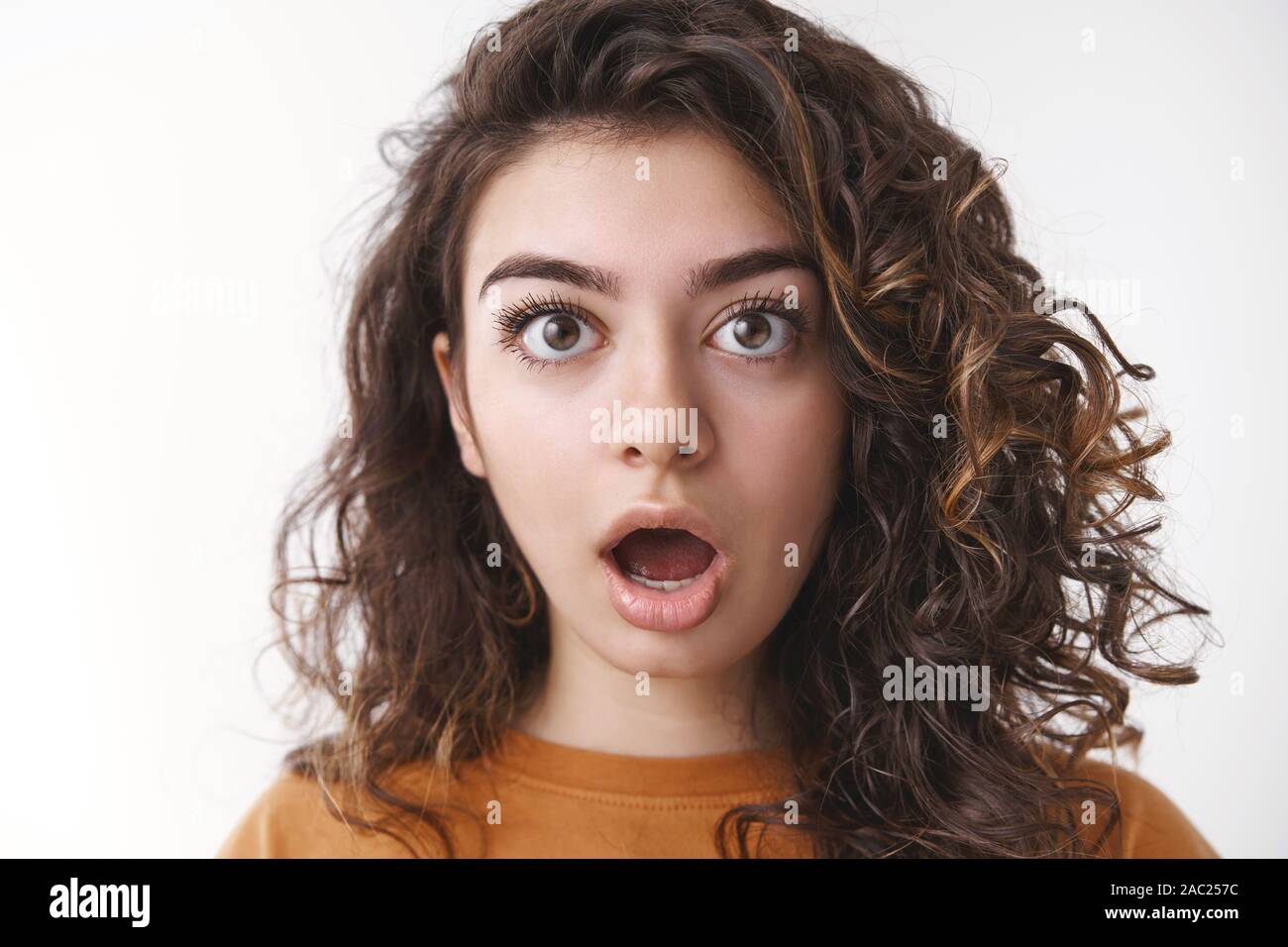 Headshot Shocked Speechless Impressed Attractive Curly Haired Caucasian