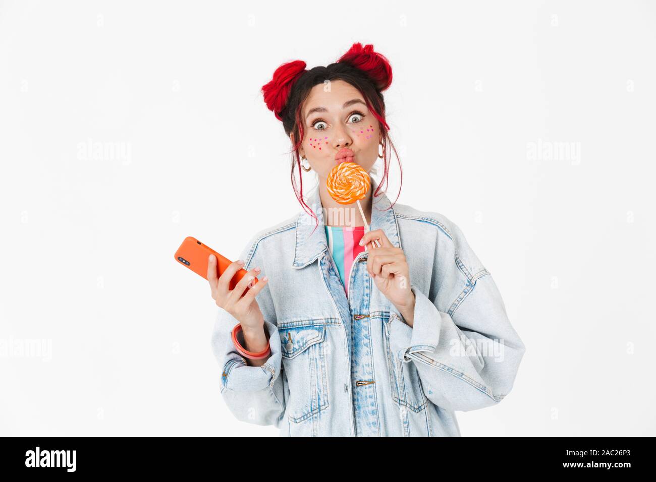Image of funny beautiful woman with freckles holding cellphone and ...