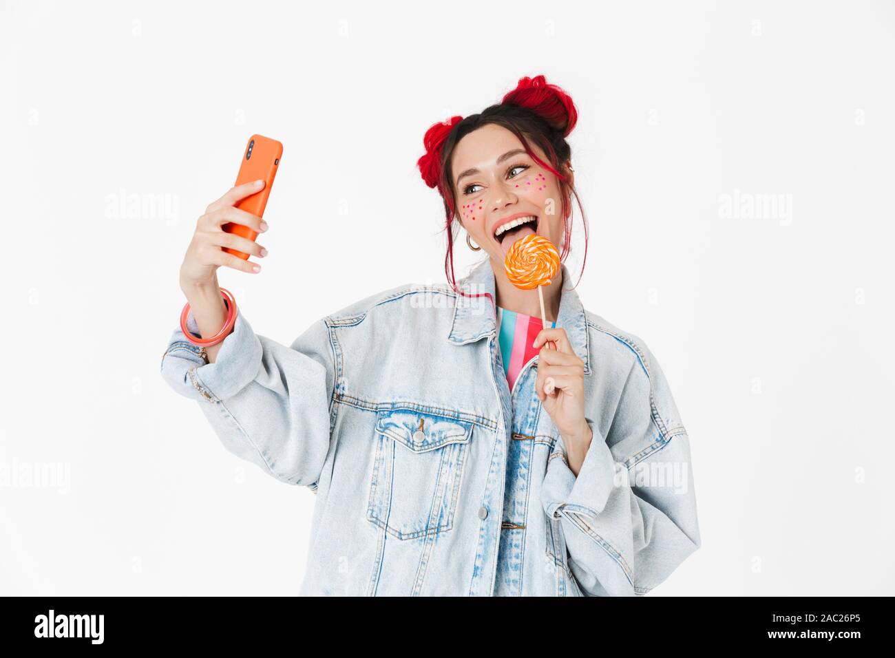 Image of funny beautiful woman with freckles using cellphone and ...