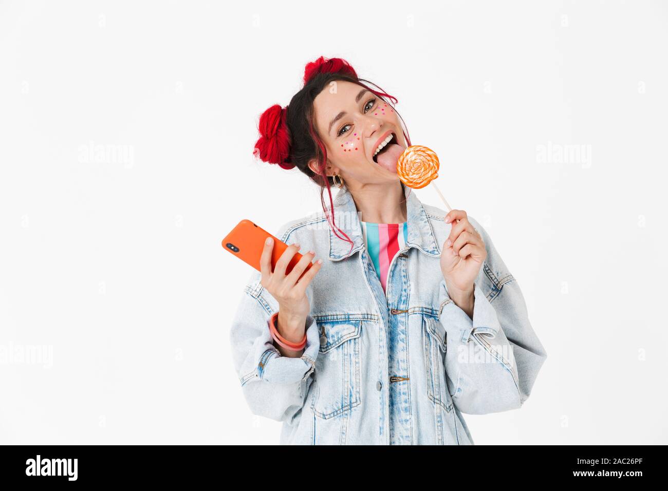 Image of joyful beautiful woman with freckles using cellphone and ...