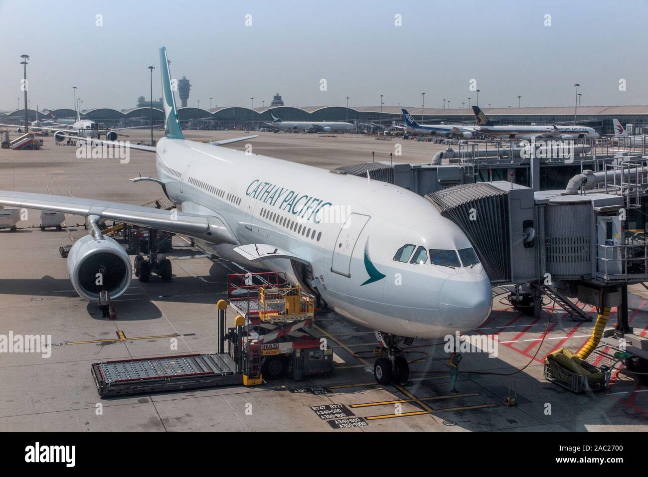 A Cathay Pacific aeroplane at Hong Kong Airport, preparing to take off ...