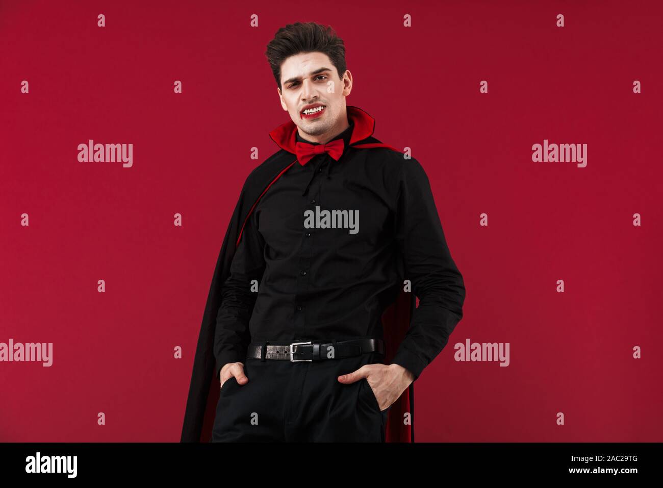 Image of mystic vampire man with blood and fangs in black halloween ...