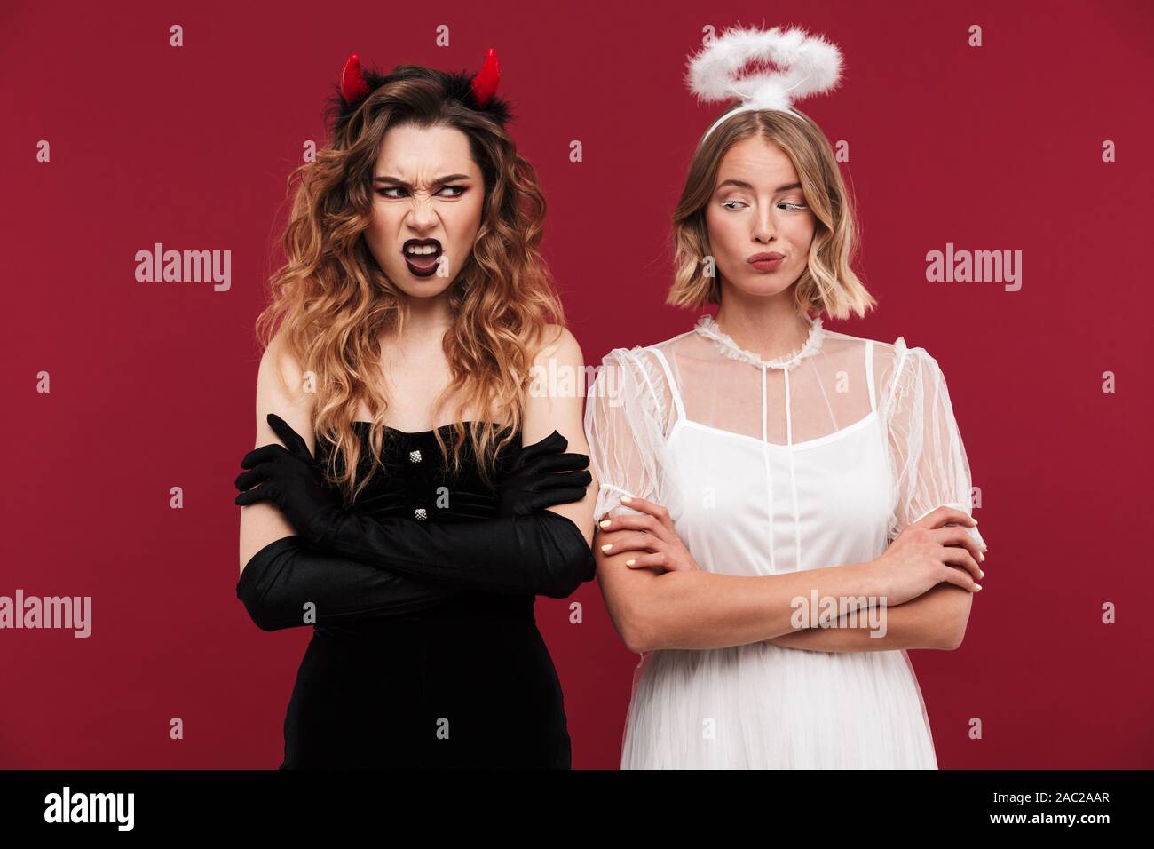Image of a displeased negative women angel and demon in carnival ...