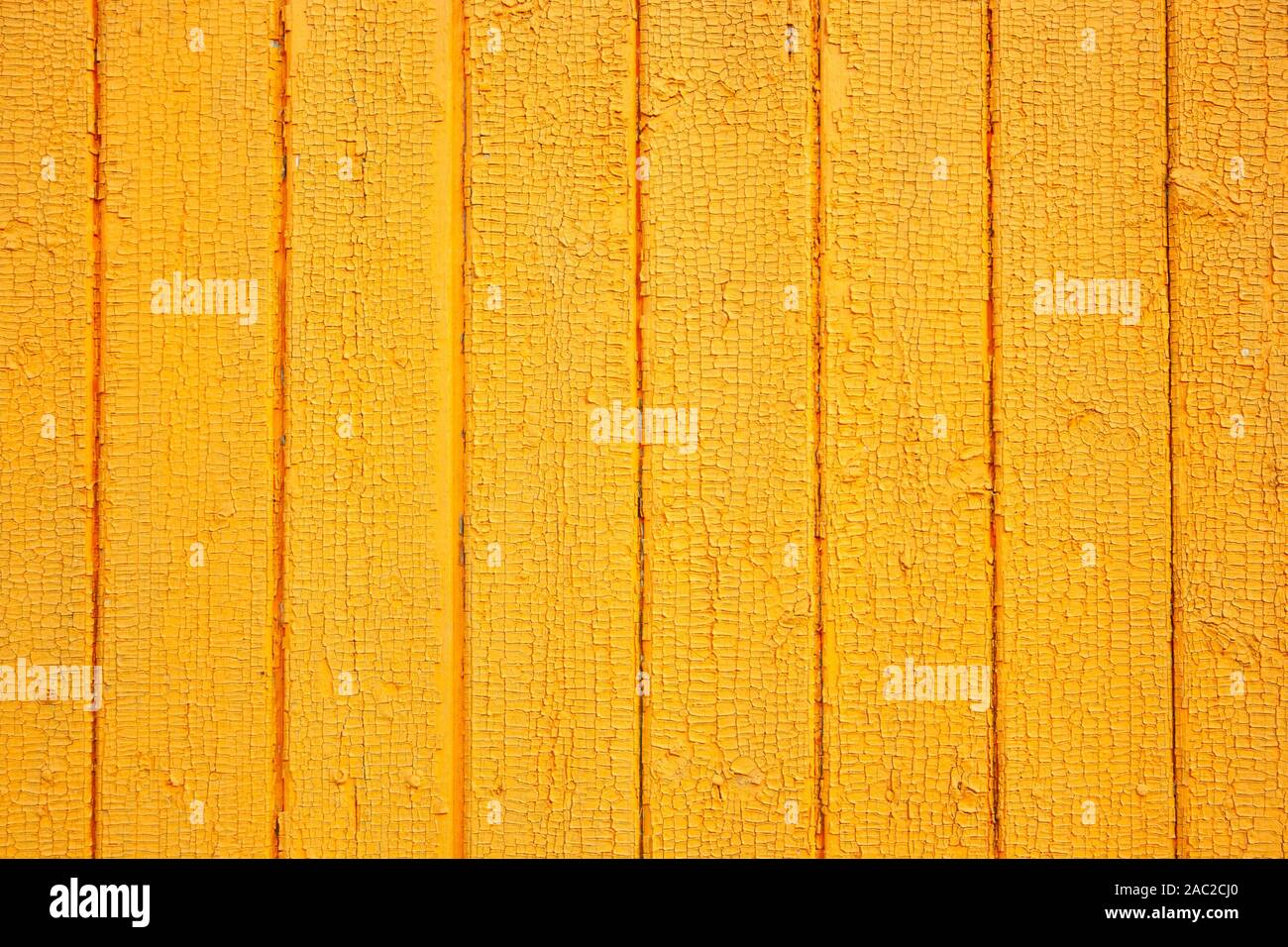 Wooden yellow wall texture. Grain wood background. Place for text ...