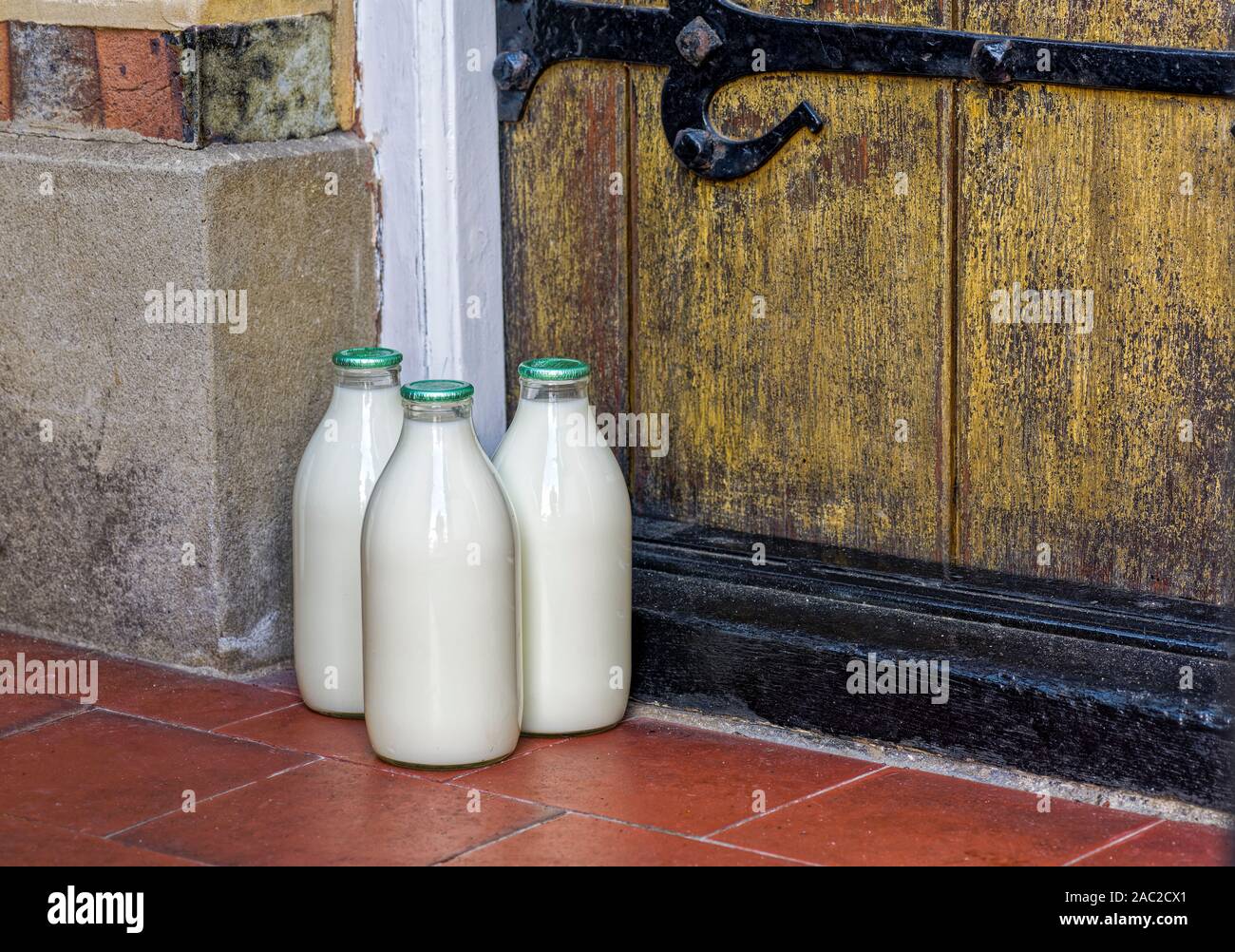 Authentic image of doorstep delivery of milk in recycleable glass ...