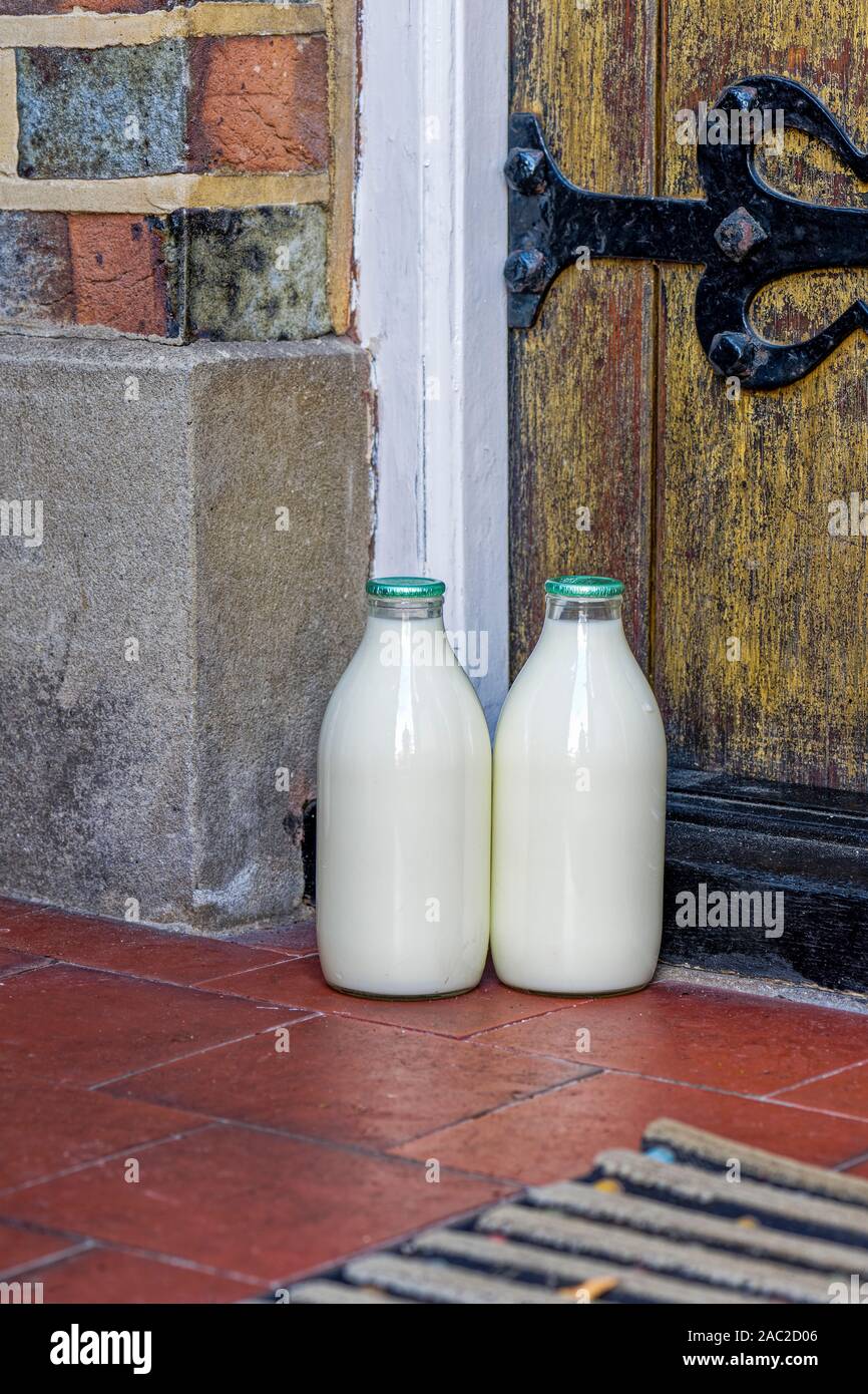 Authentic image of doorstep delivery of milk in recycleable glass ...