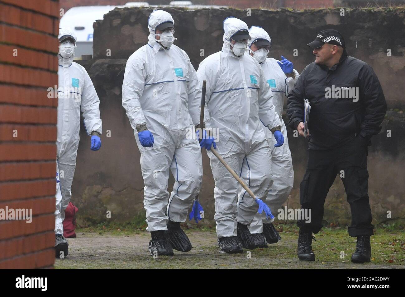 Forensic search team attend a three-storey block of flats in ...