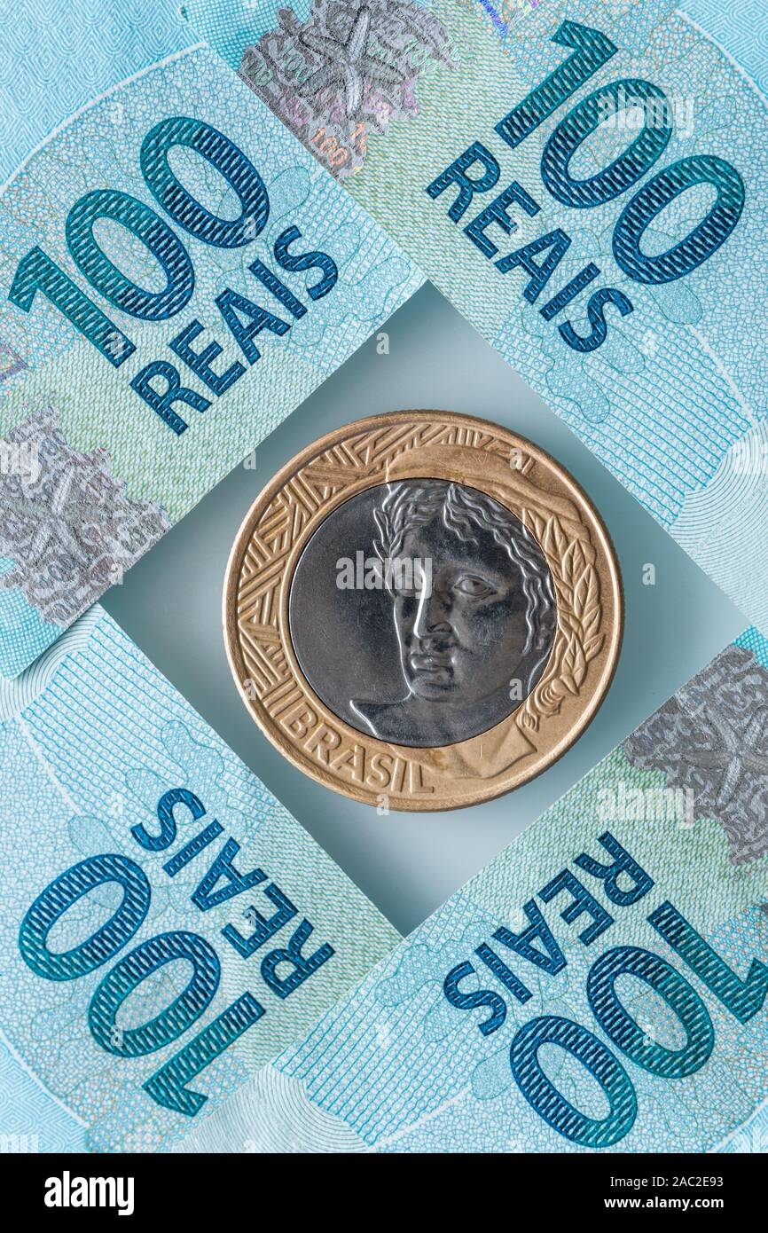 Brazilian Real coin and 100 Reais banknotes Stock Photo - Alamy