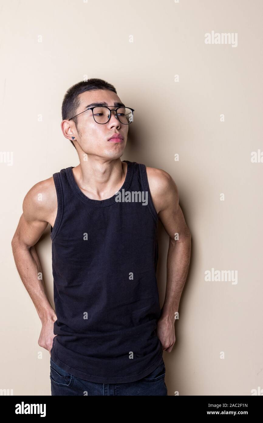 Young serious man looking at camera Stock Photo - Alamy