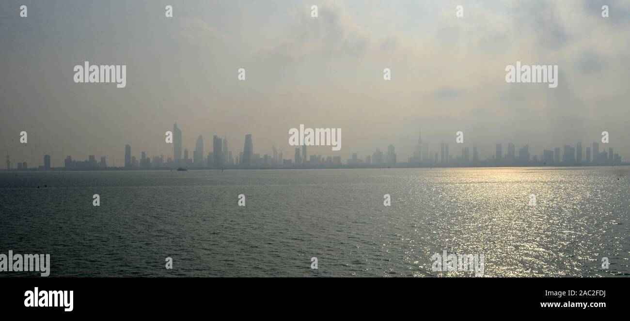 Kuwait City, Kuwait. 30th Nov, 2019. Buildings are shrouded in fog in ...