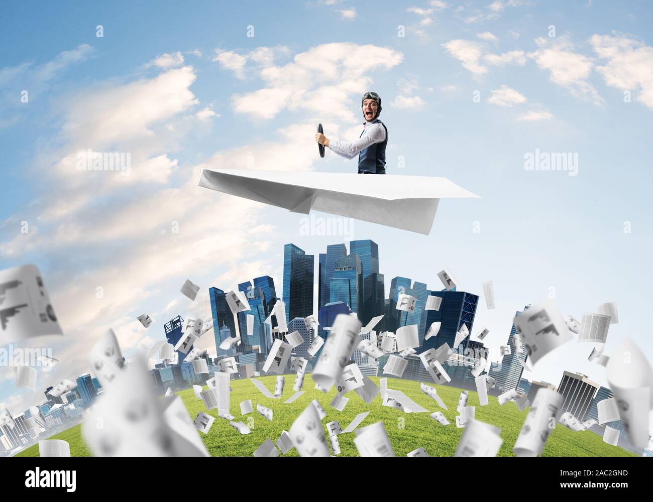 Expressive aviator driving paper plane Stock Photo - Alamy