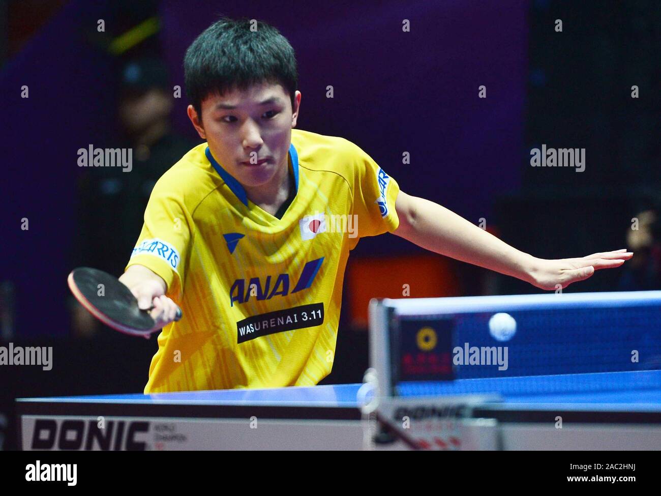 Tomokazu Harimoto of Japan in action against Quadri Aruna of Nigeria in ...