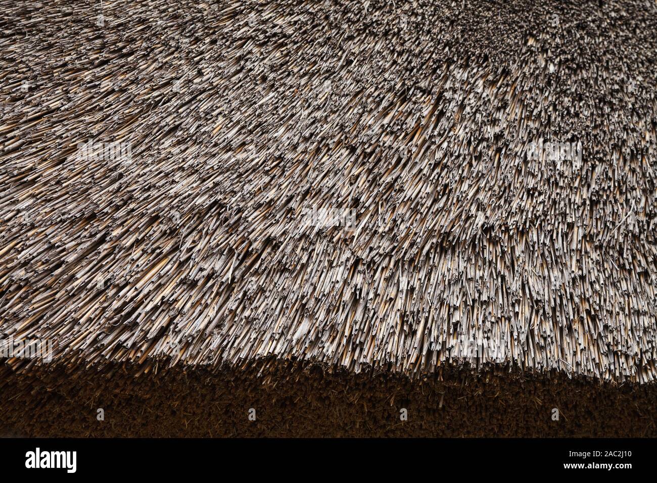 Straw roof abstract background, texture Stock Photo - Alamy