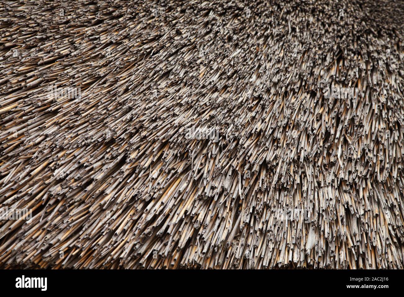 Straw roof abstract background, texture Stock Photo - Alamy