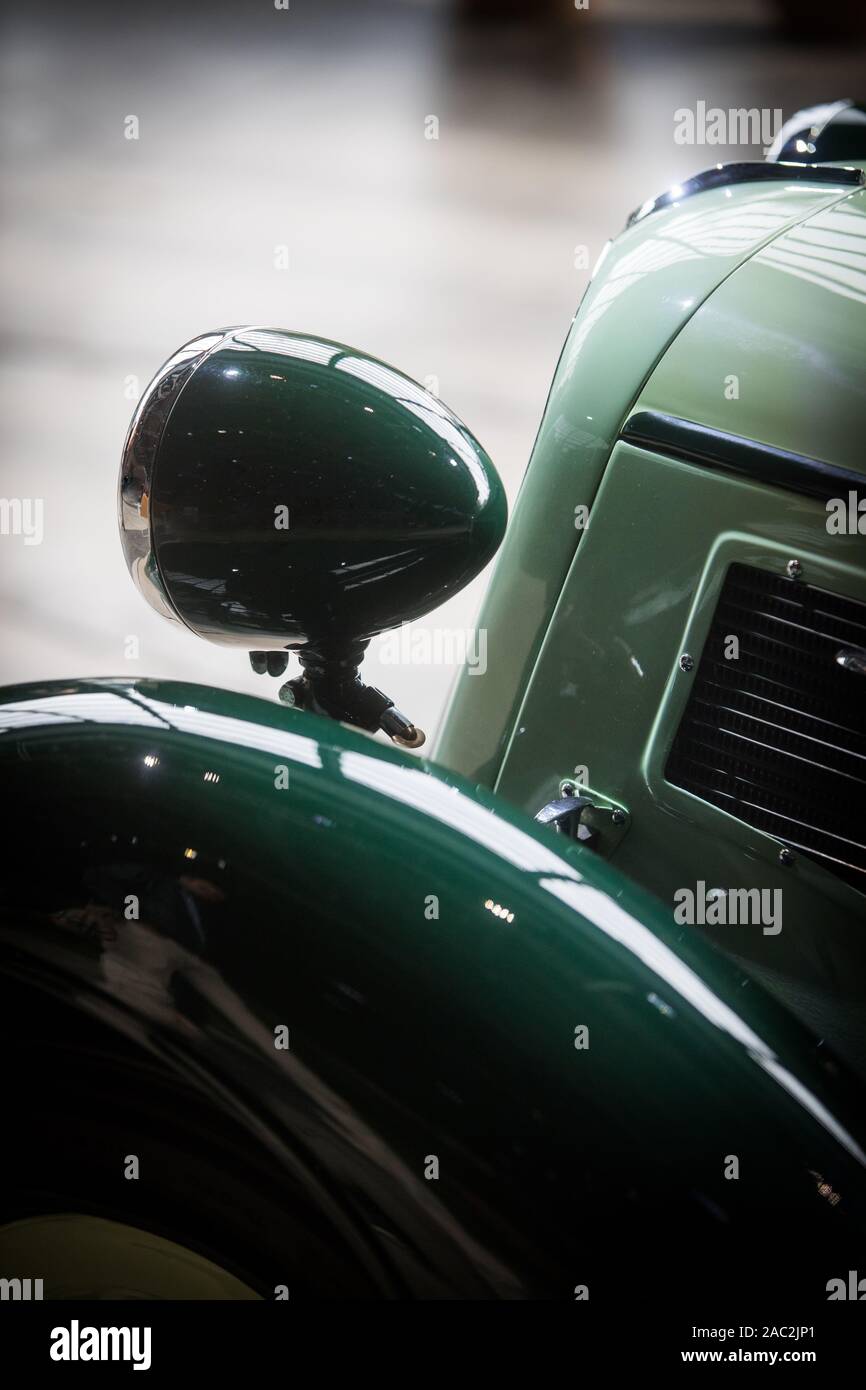 Close up vertical image of the headlight of a vintage classic car Stock ...