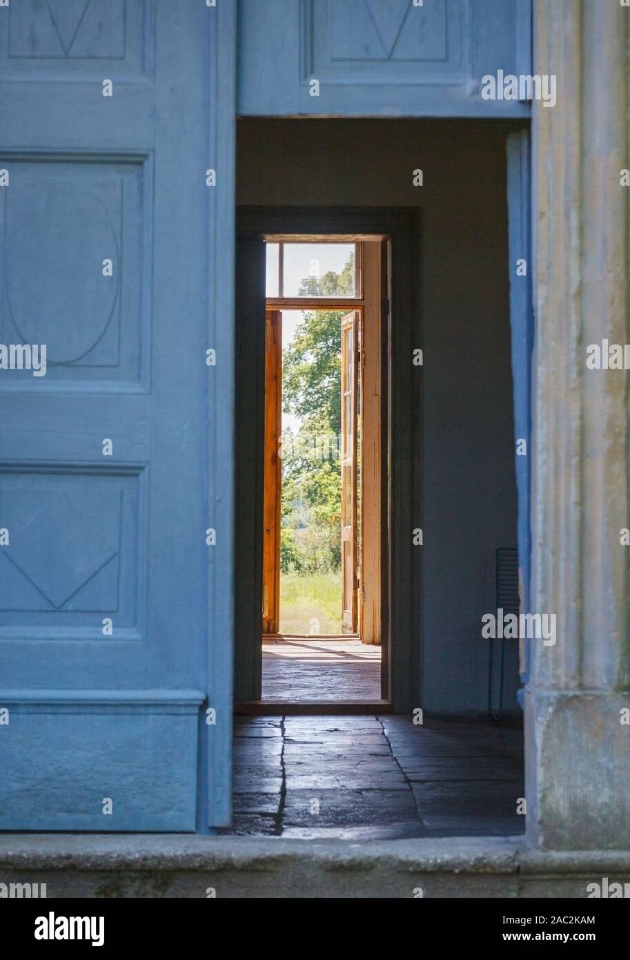 View through doors on manor house Stock Photo - Alamy