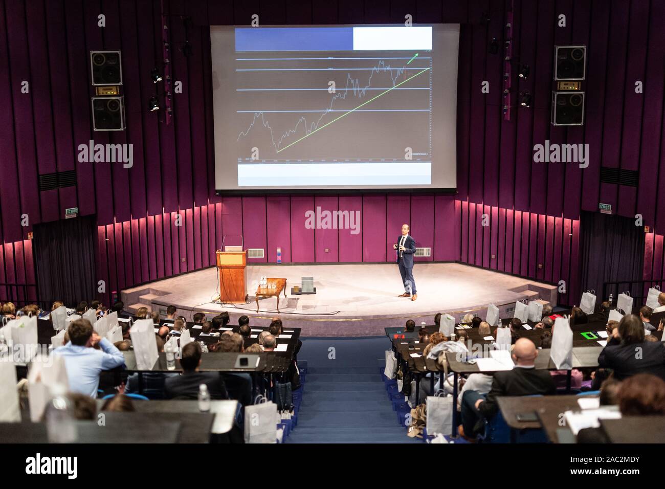 Speaker giving presentation on business conference event Stock Photo ...