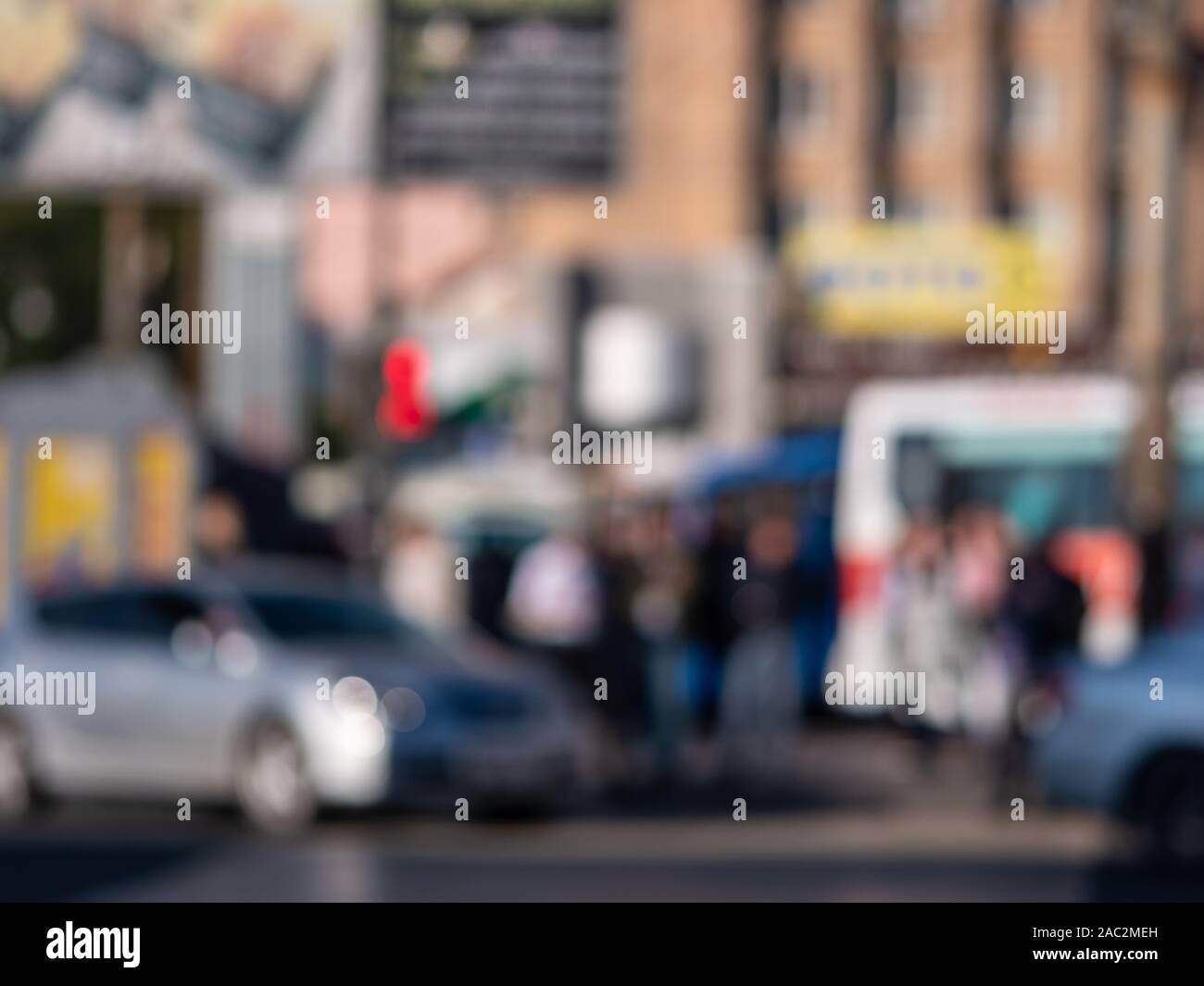 Out of focus background with people crossing street Stock Photo - Alamy