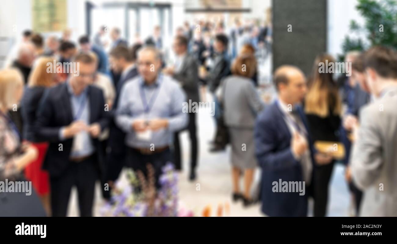Abstract blured photo of business people socializing during banquet ...