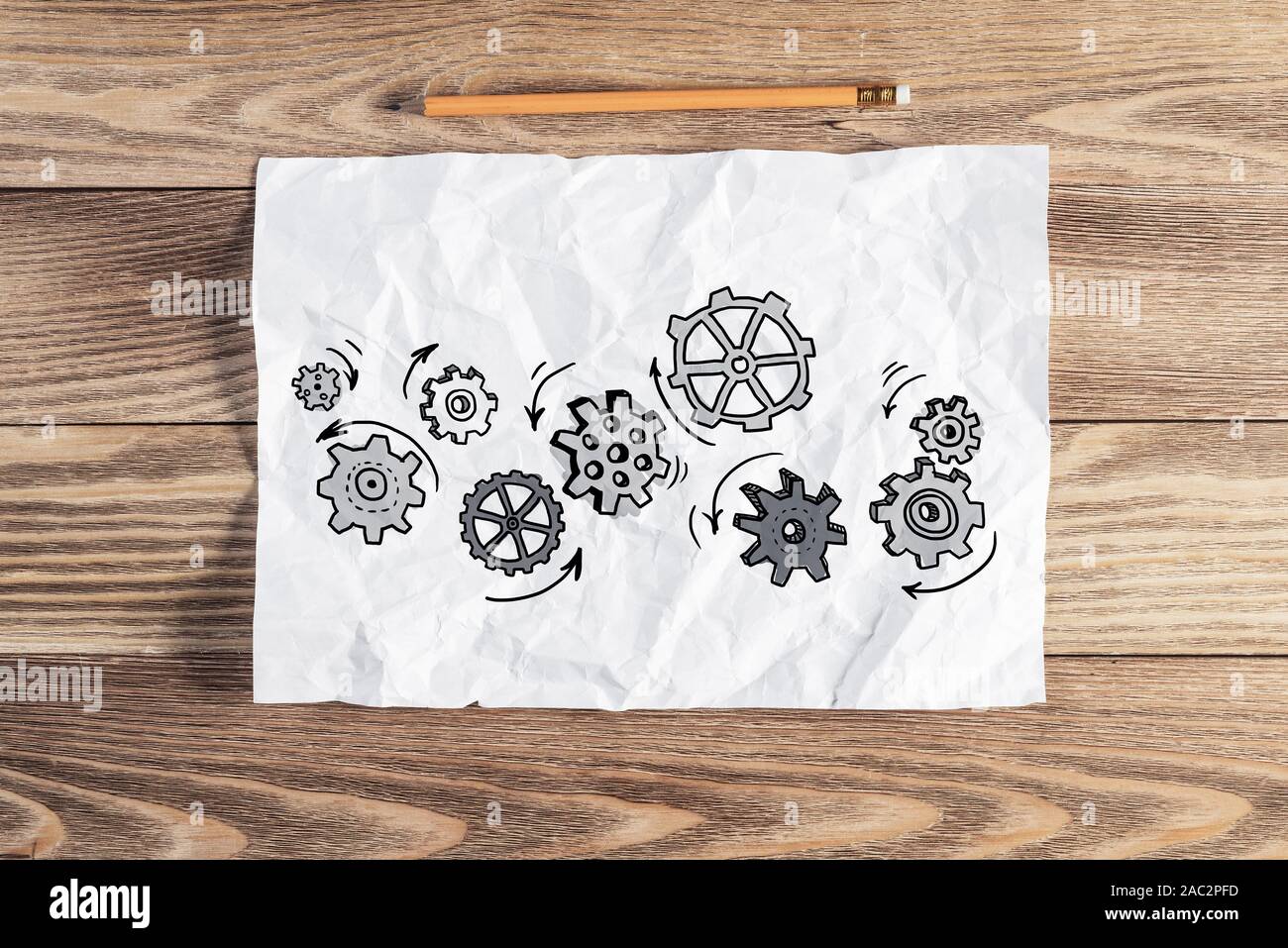 Group of rotating gears pencil hand drawn Stock Photo - Alamy