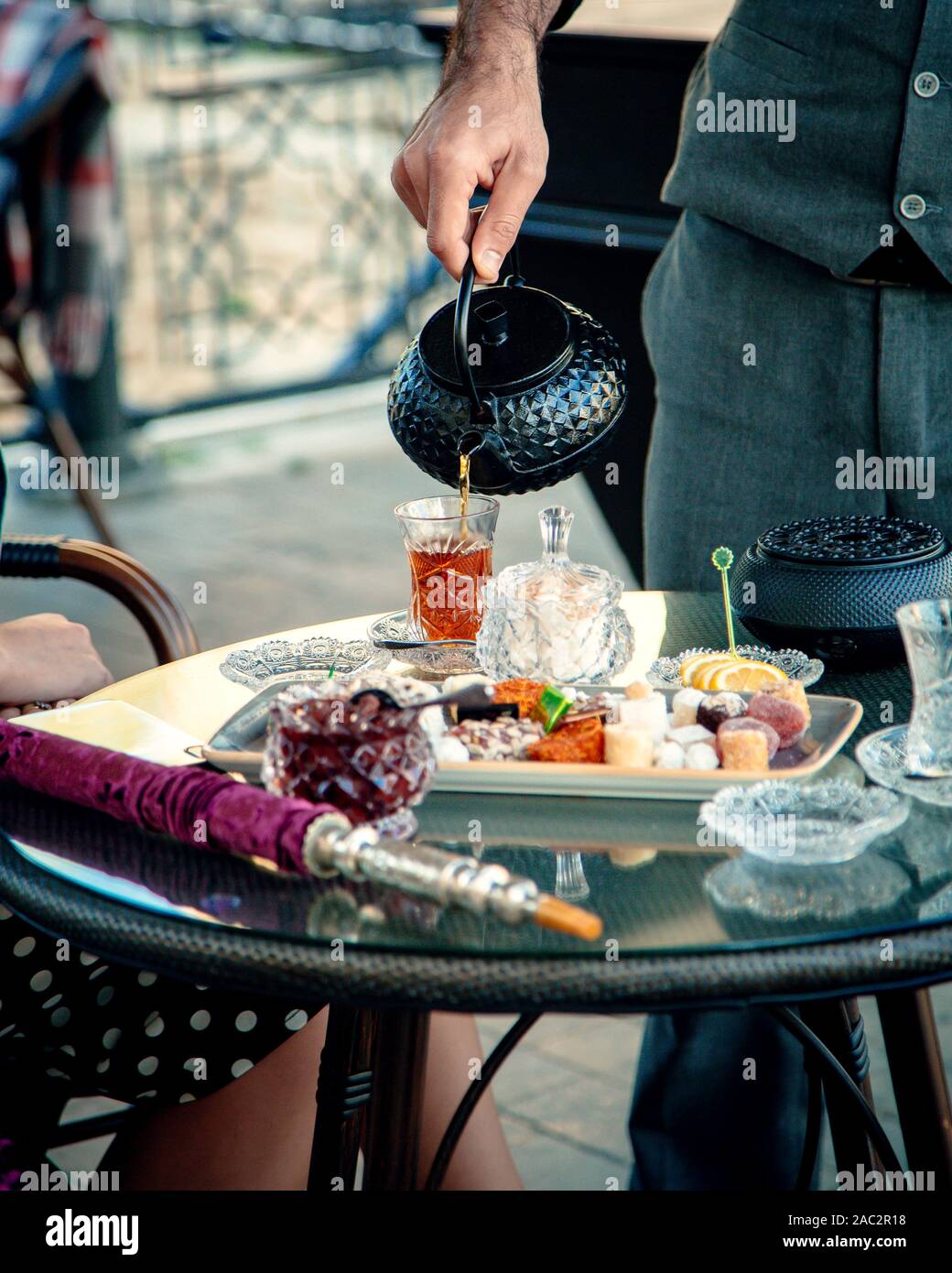 tea set with black tea and hookah Stock Photo - Alamy