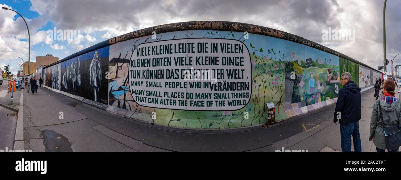 Paintings and graffiti on the remains of the Berlin Wall in Germany ...