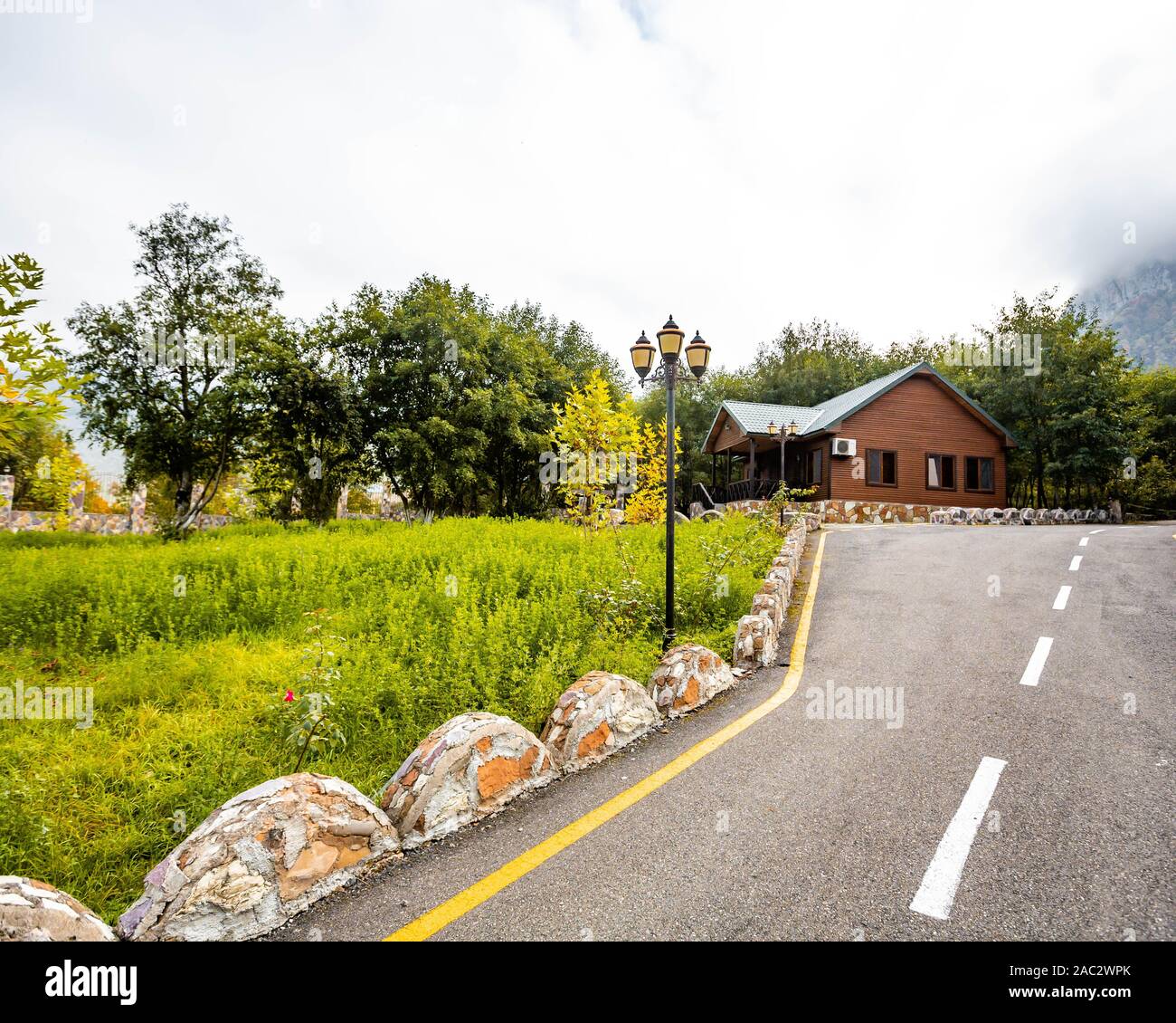 a road to wooden house Stock Photo - Alamy