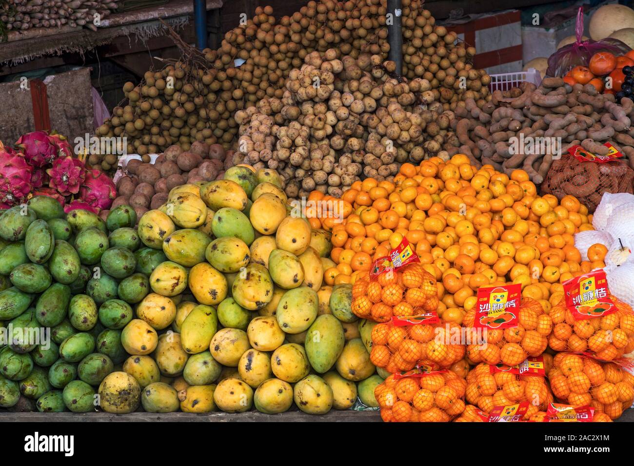 Colourful market stand with tropical fruits, Phosi market, Luang ...