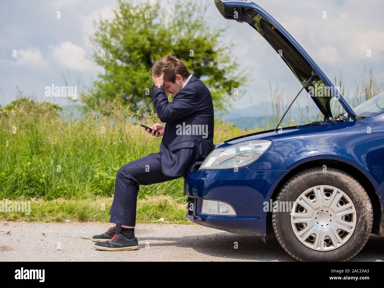 Man in accident on hood of a car hi-res stock photography and images ...