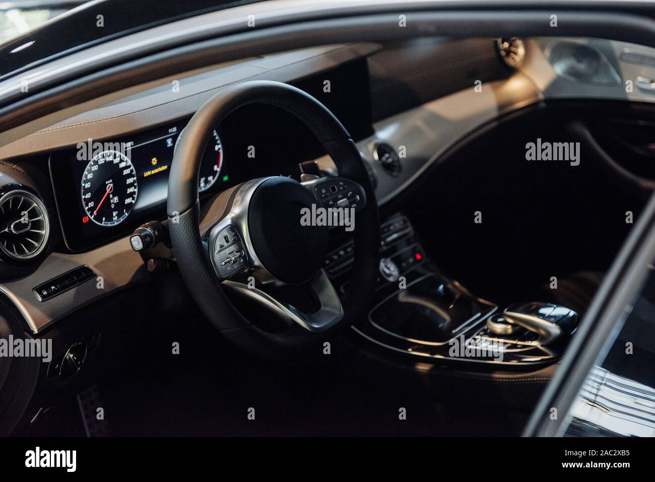 Electronic devices. Inside of the modern car. Steering wheel and front ...