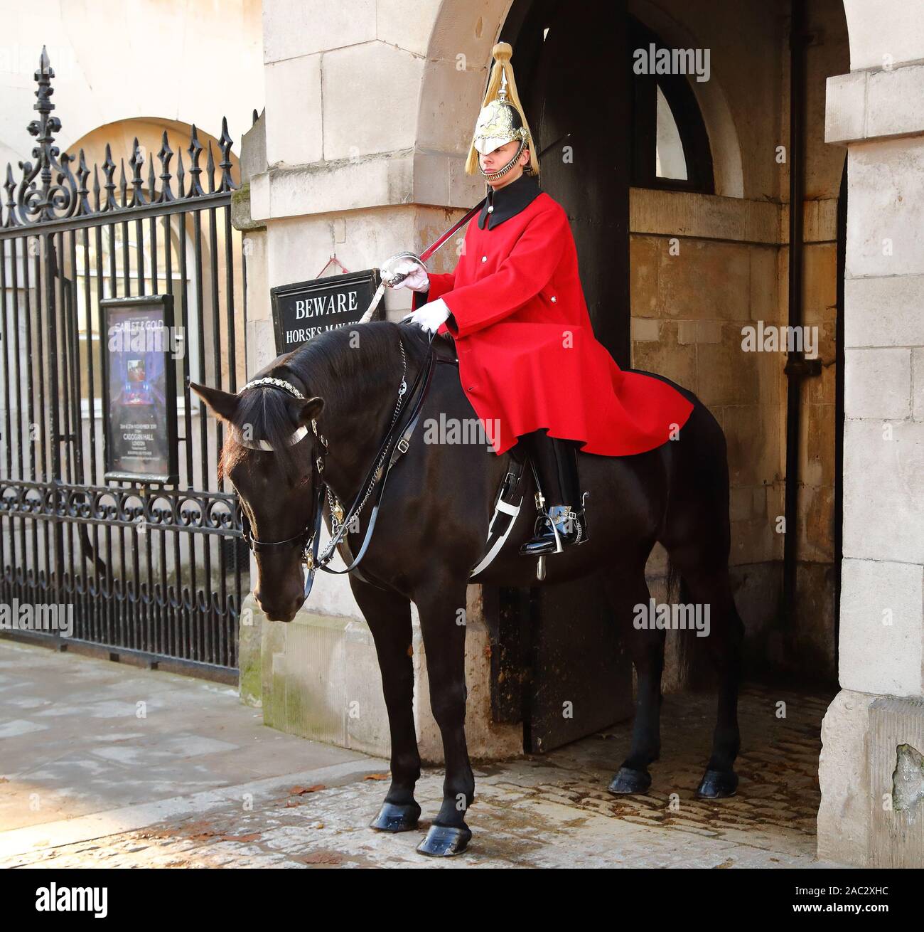 Household Cavalry in their traditional long red uniform coats at ...