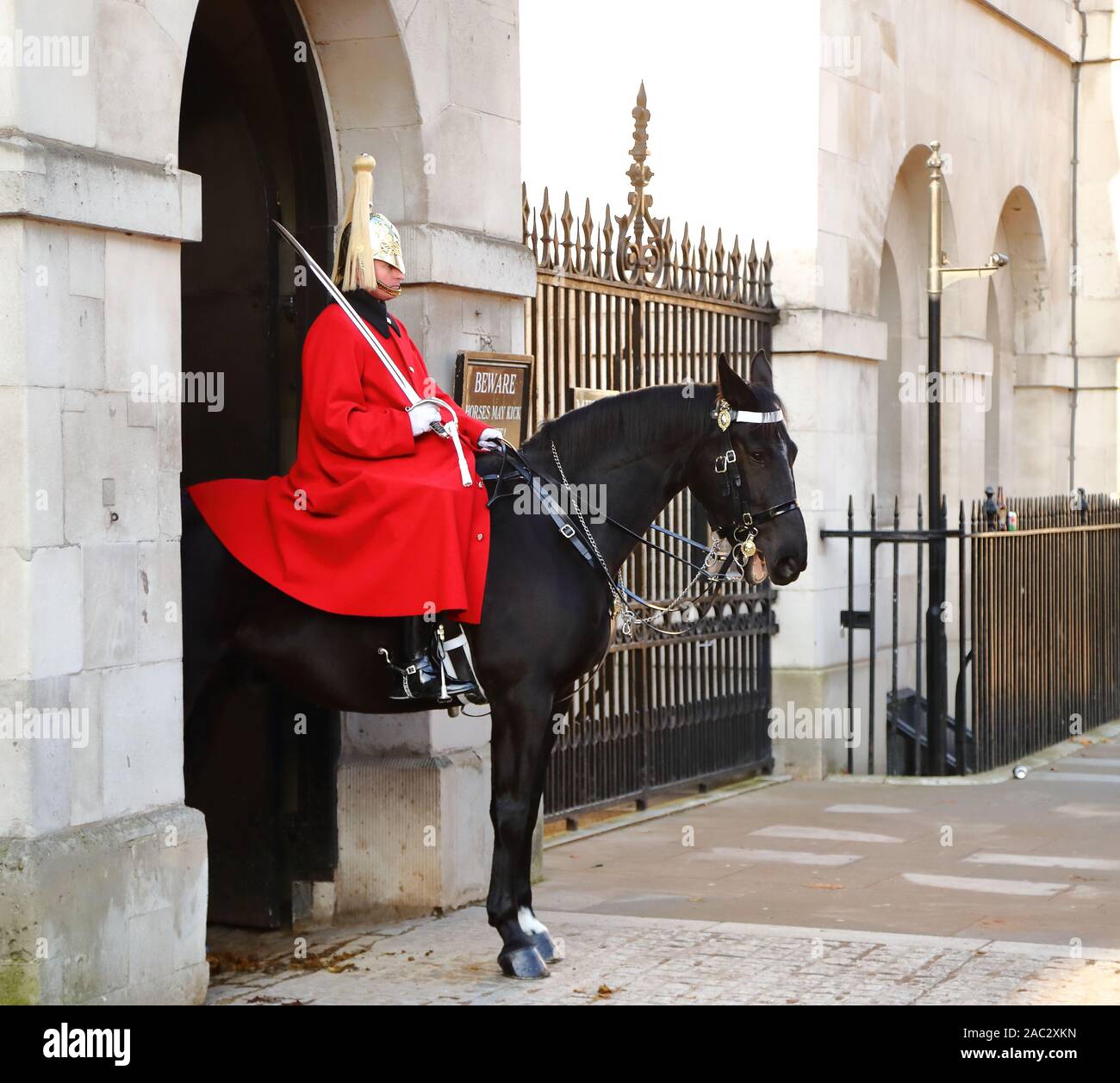 Household Cavalry in their traditional long red uniform coats at ...