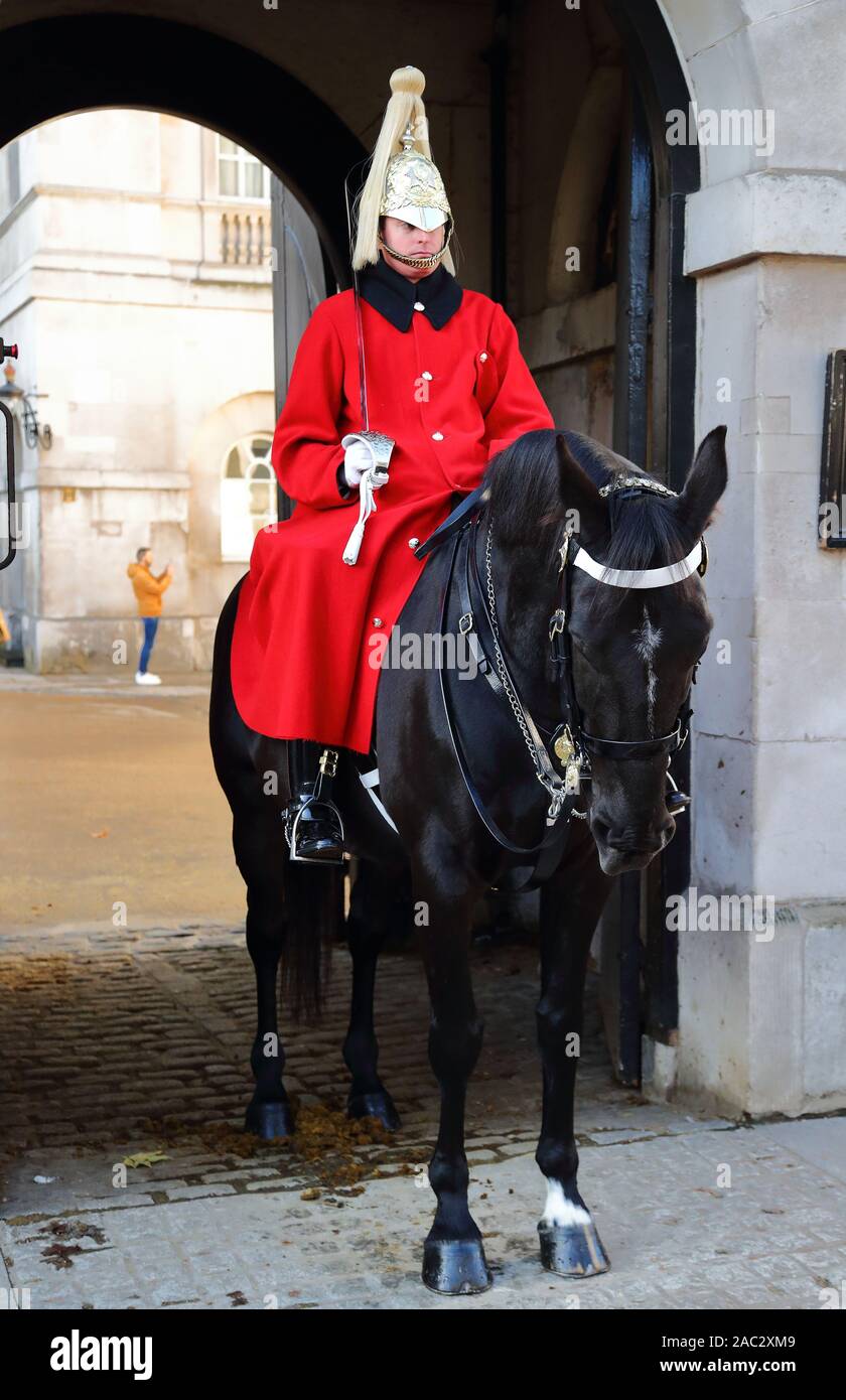Household Cavalry in their traditional long red uniform coats at ...