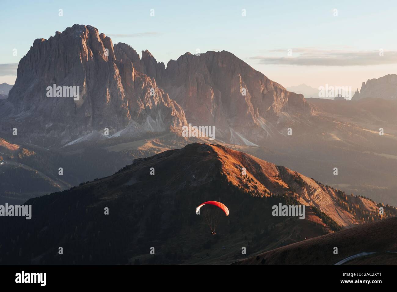 Extremal paragliding over the Seceda mountains in the Italy Stock Photo ...