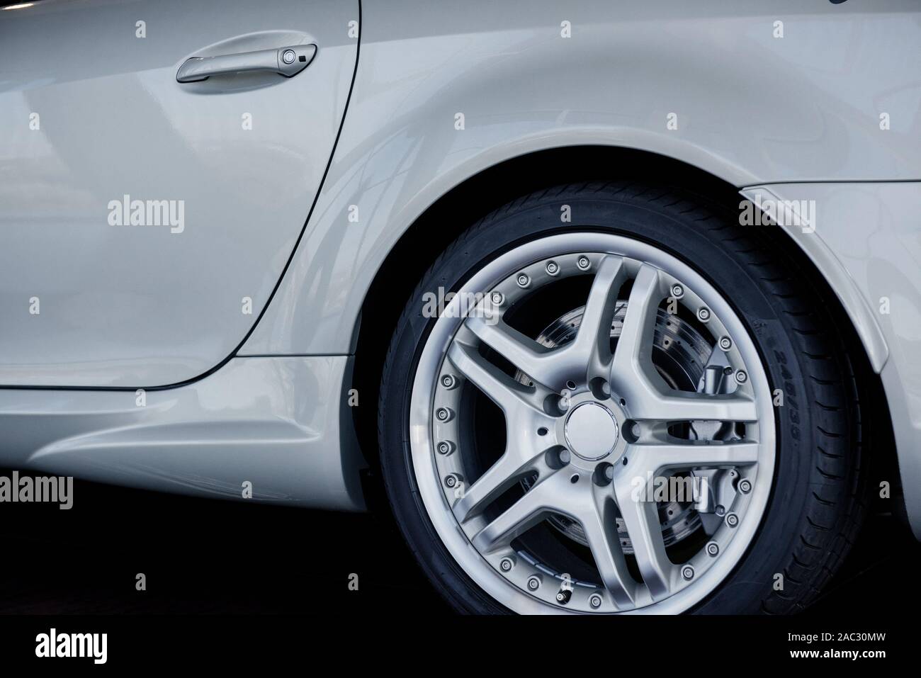Rear part of modern white bright car standing indoors Stock Photo - Alamy