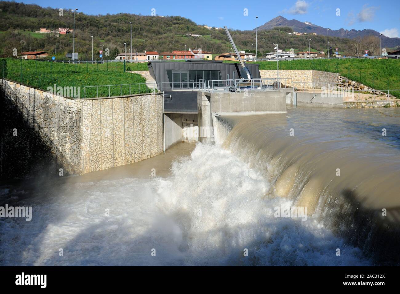 hydroelectric power plant, hydropower system, uses a dam to store river ...