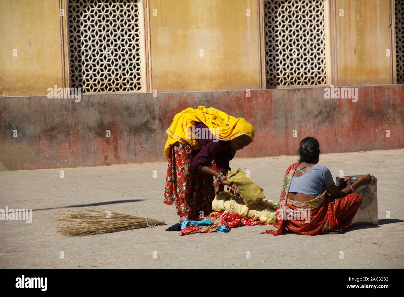 Indian women cleaning street hi-res stock photography and images - Alamy