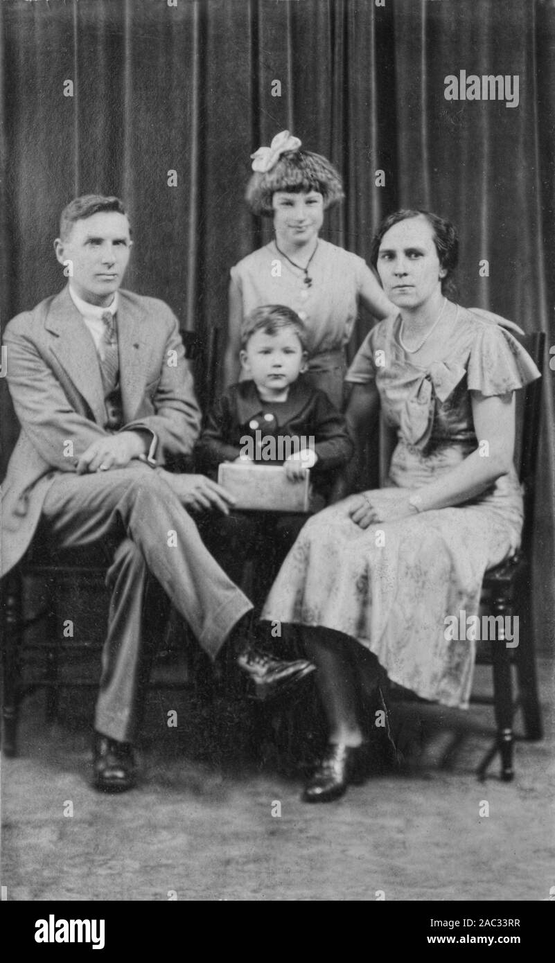 Vintage photo of Russian family in photo studio. Photo was taken at ...