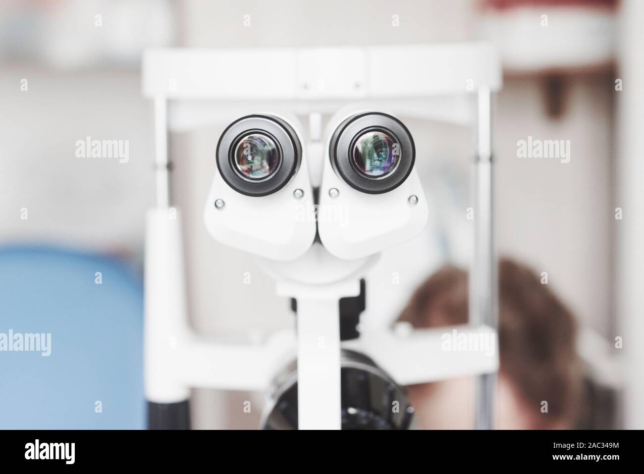 Front view of the professional optician's device for eye examination ...