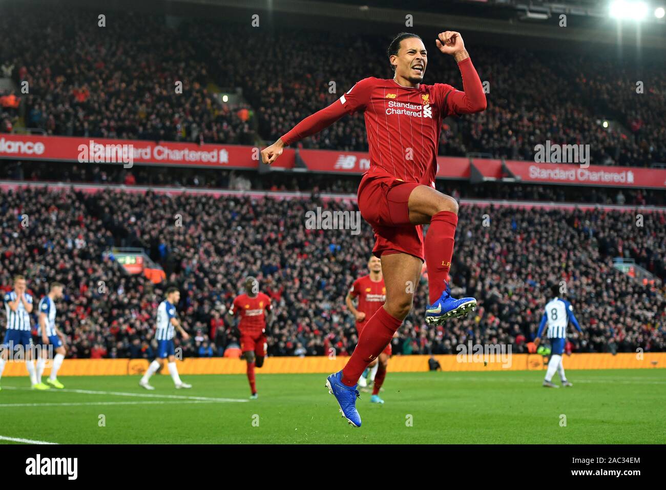 Liverpool's Virgil van Dijk celebrates scoring his second sides goal ...
