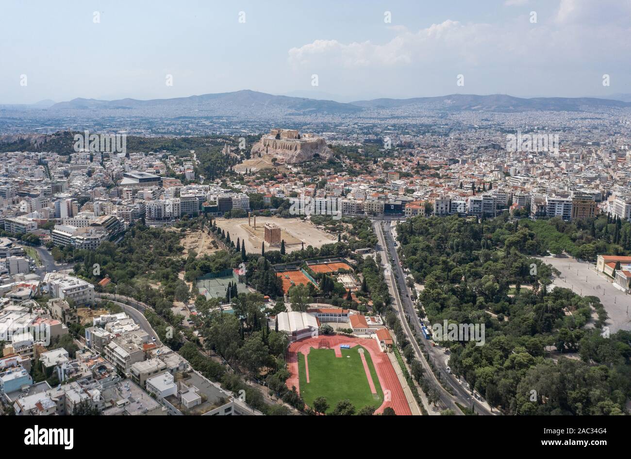 Aerial drone shot of Acropolis of Athens and Filopappou Hill, Zeus Olympion Temple and Zappeion ...