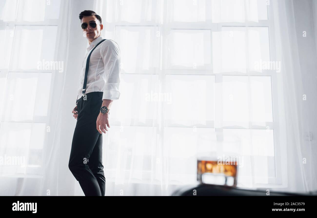 Man in suit standing straight hi-res stock photography and images - Alamy