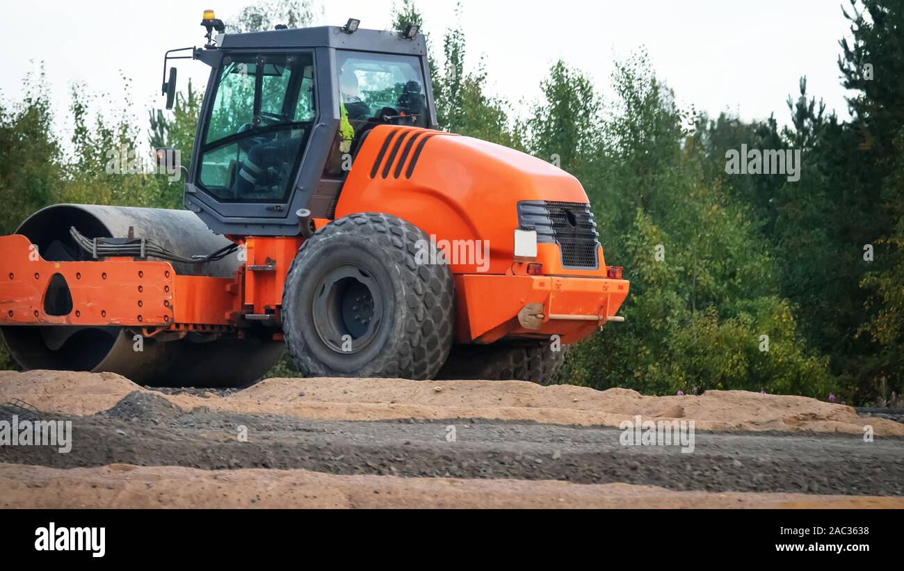 Road construction, soil packer Stock Photo - Alamy