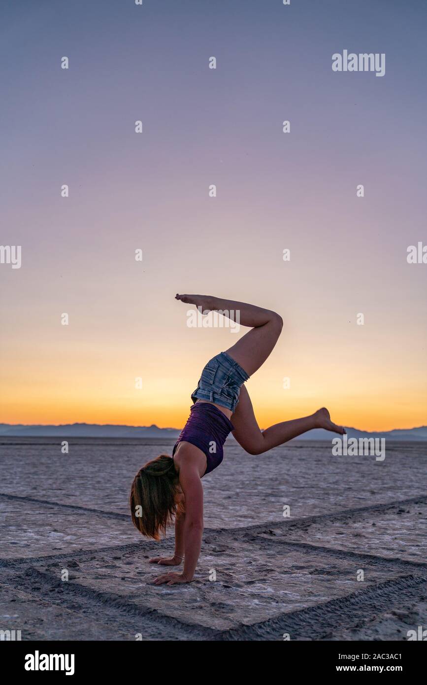 Beautiful Woman Doing Handstands During Sunset In the Bonneville Salt ...