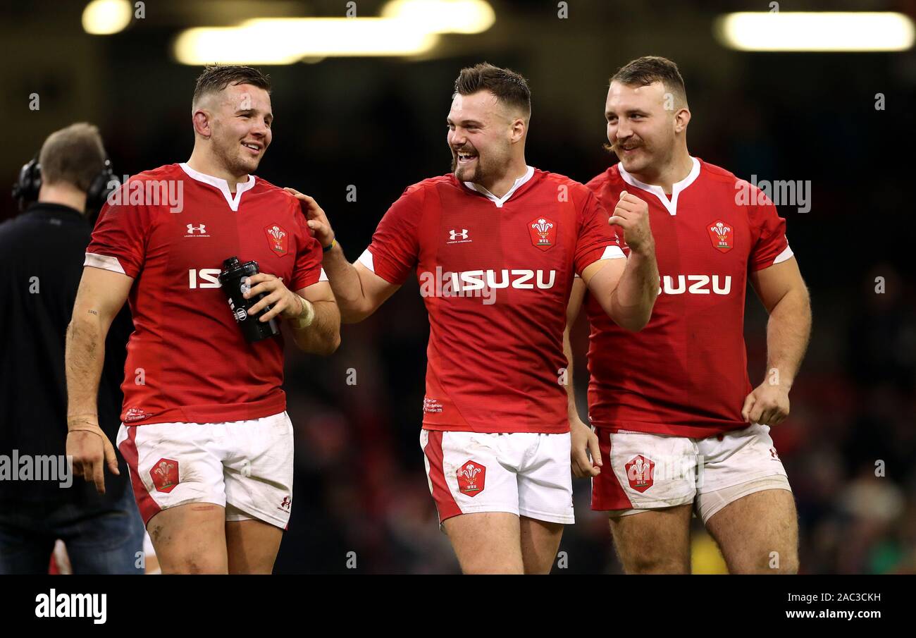 Wales’ Elliot Dee (left), Owen Lane (centre) and Dillon Lewis after the ...