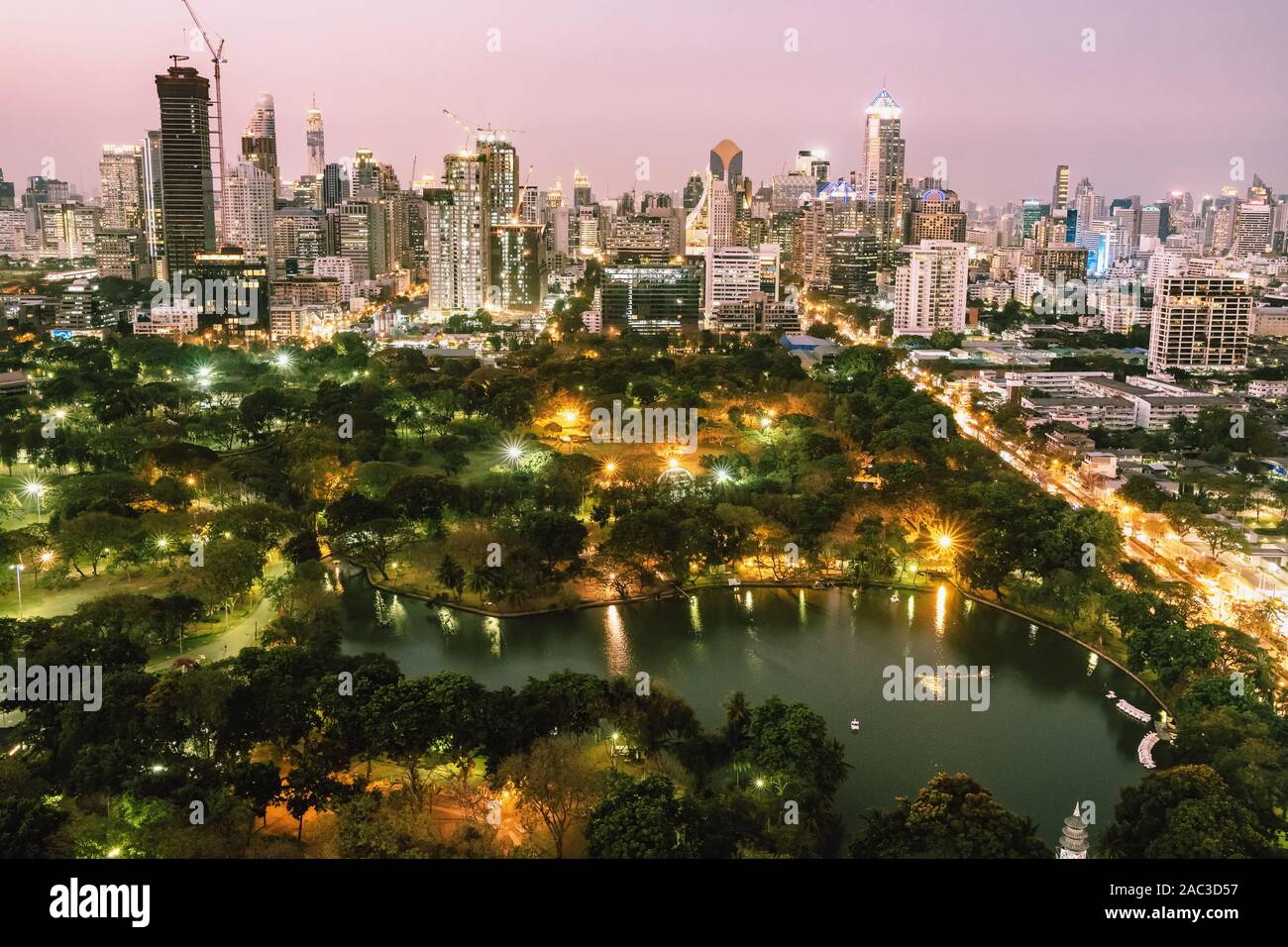 Bangkok city skyline with Lumpini park and urban skyscrapers at ...
