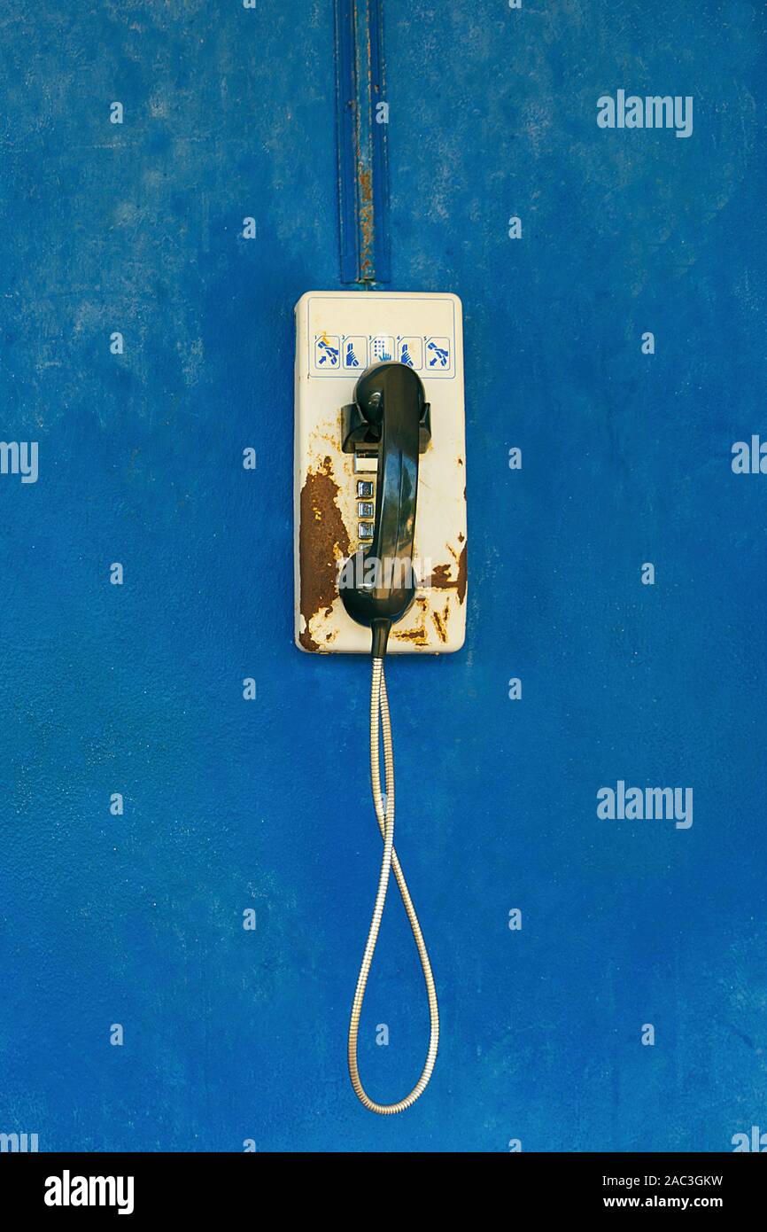Vintage telephone hanging on the wall hi-res stock photography and ...
