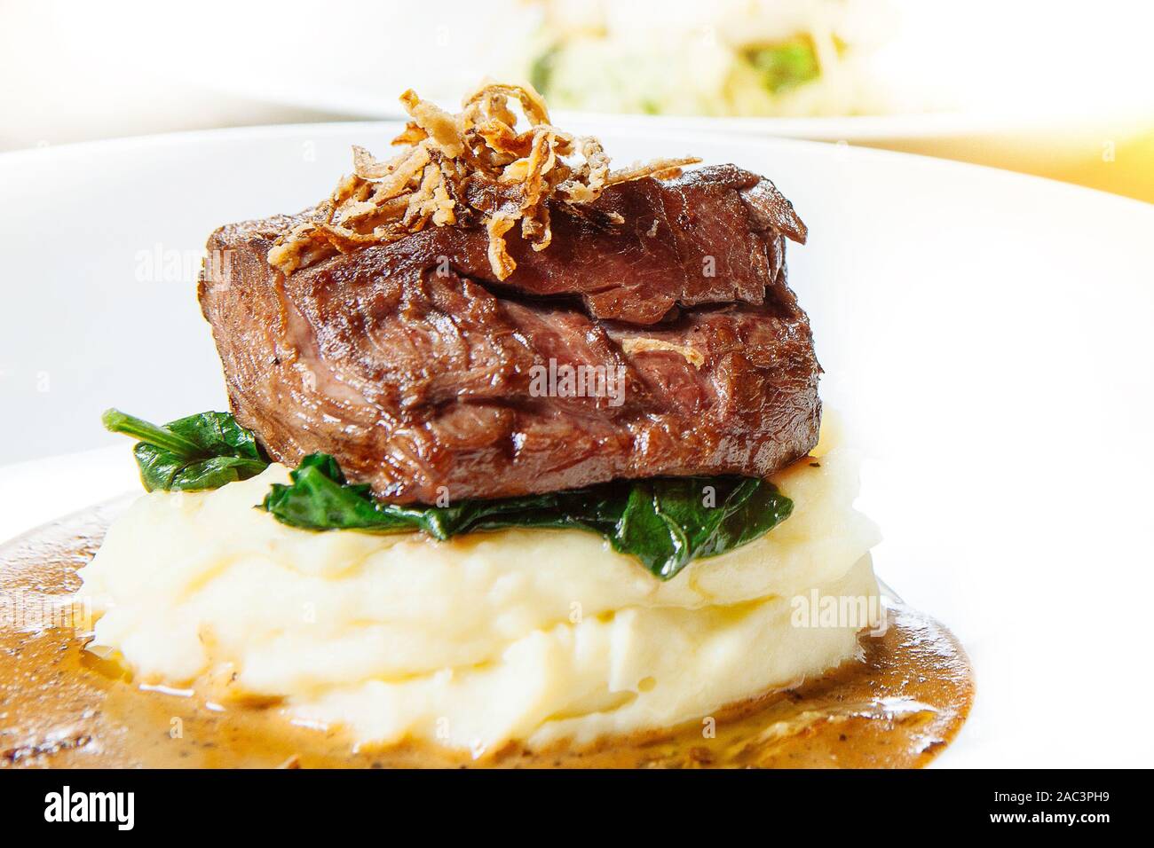 juicy steak beef meat and mashed potatoes Stock Photo - Alamy