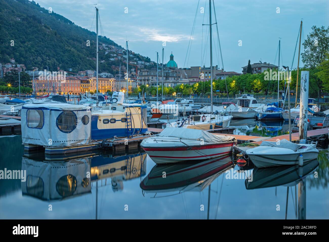 Como - The harbour with the lake Como at dusk Stock Photo - Alamy